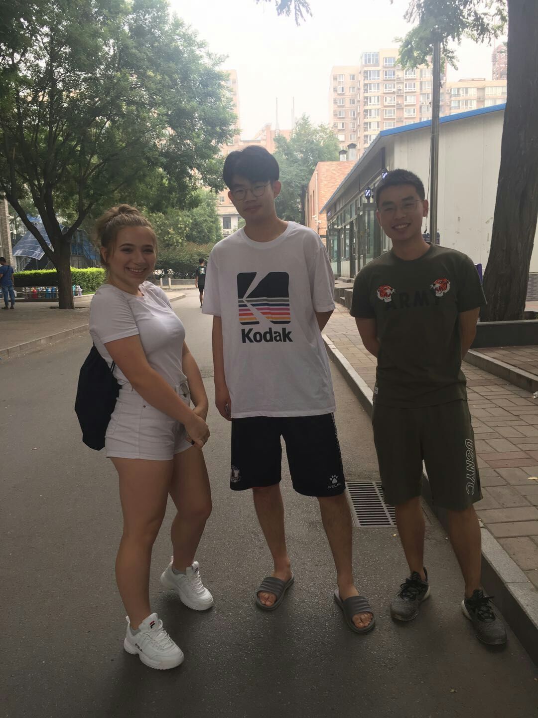 Students interacting with Chinese peer.